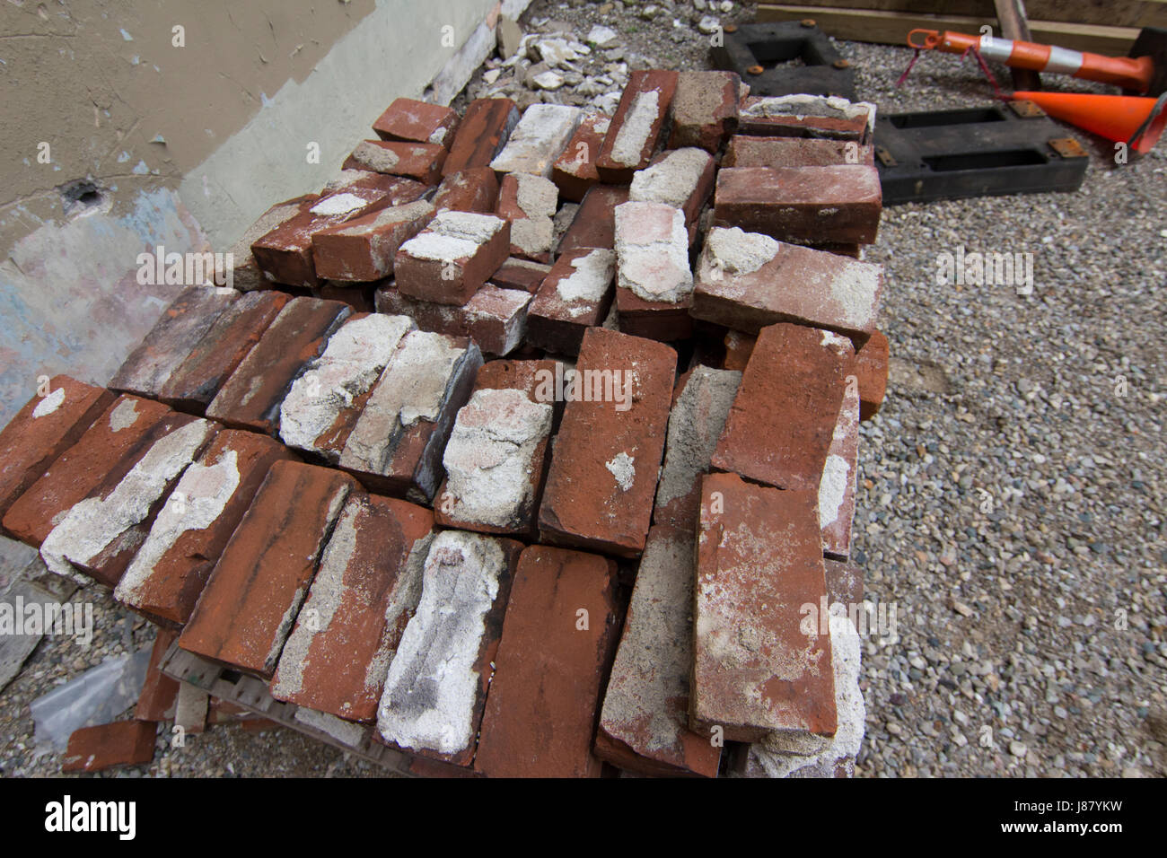 Pile of old bricks sitting on a pallet Stock Photo - Alamy
