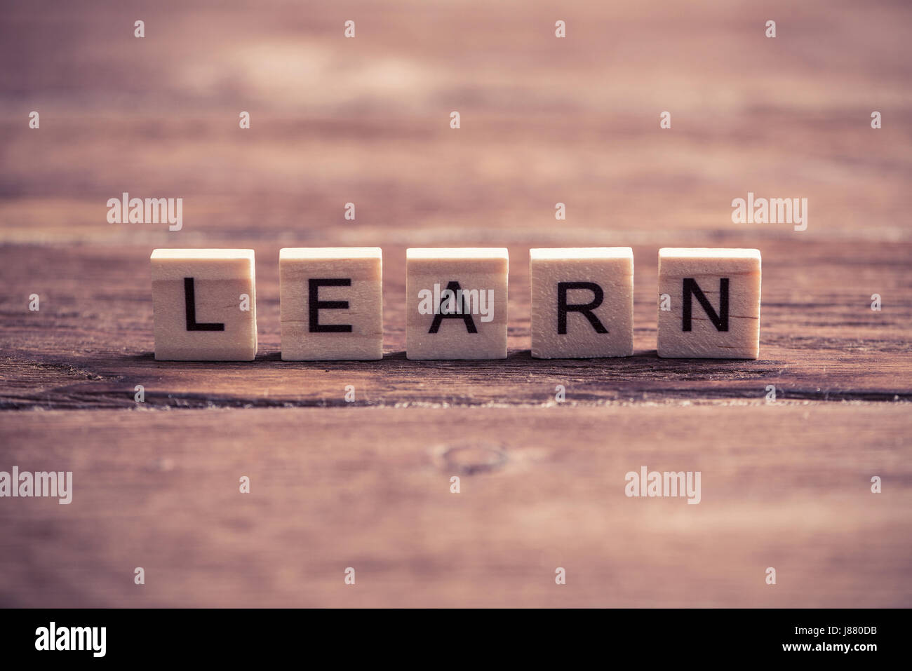 wooden elements with letter collected word learn Stock Photo - Alamy