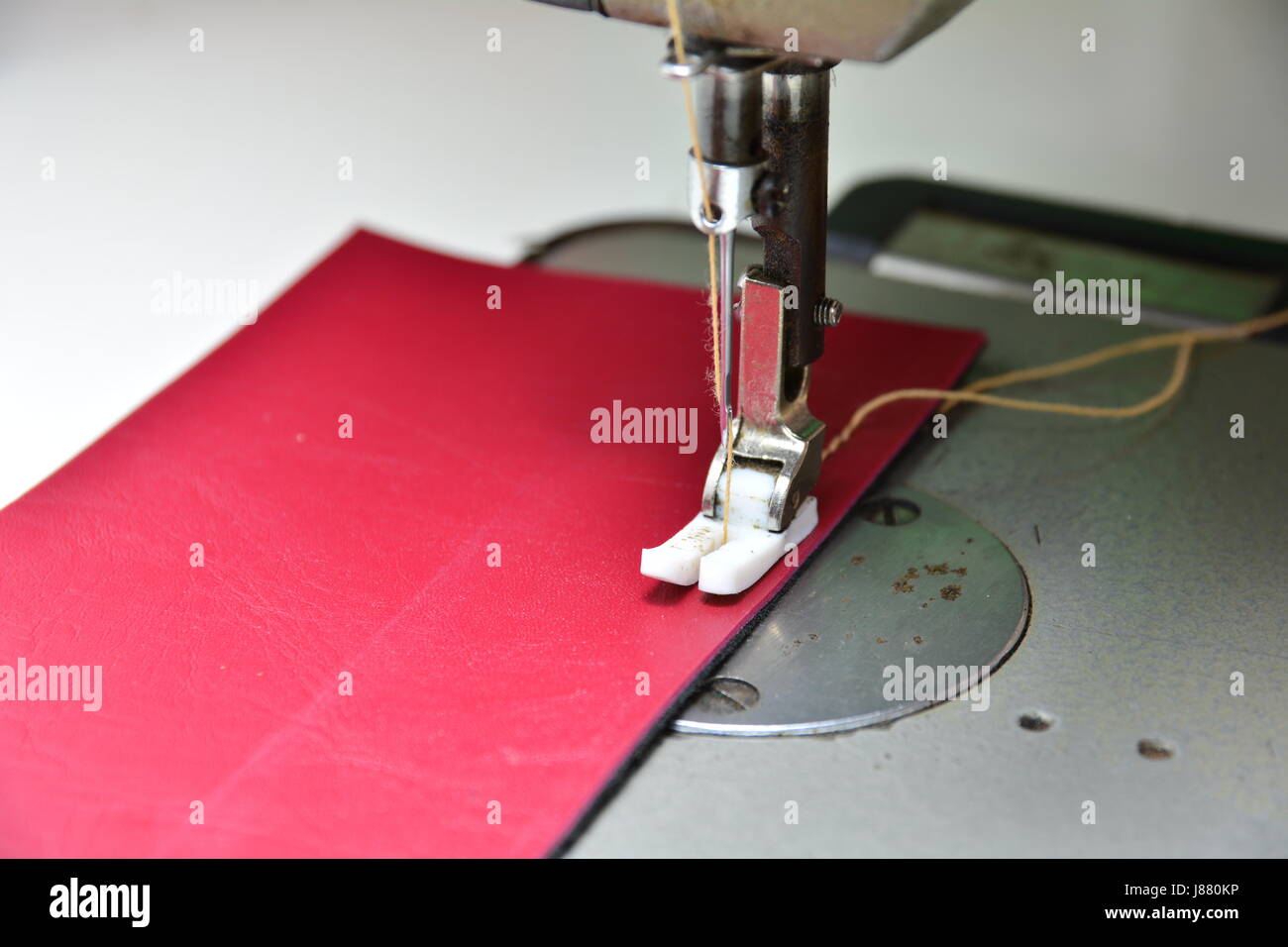 sewing process in the phase of over stitching Stock Photo - Alamy
