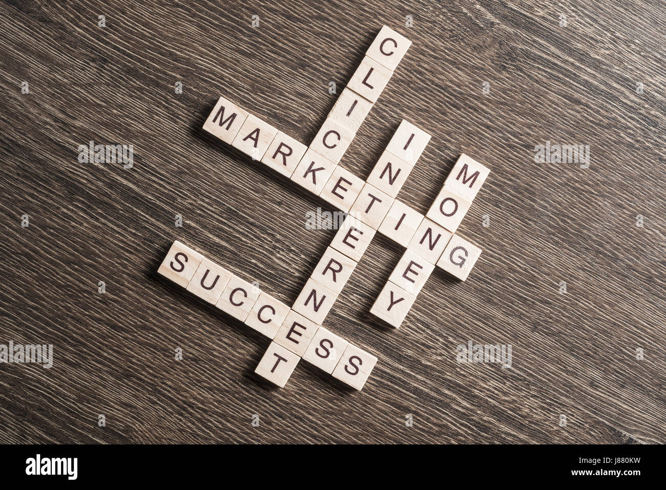 Conceptual business keywords on table with elements of game making ...