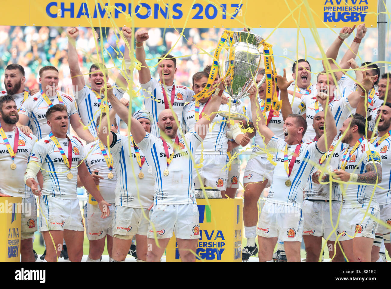 Exeter Chiefs players lift the trophy as they celebrate winning the ...