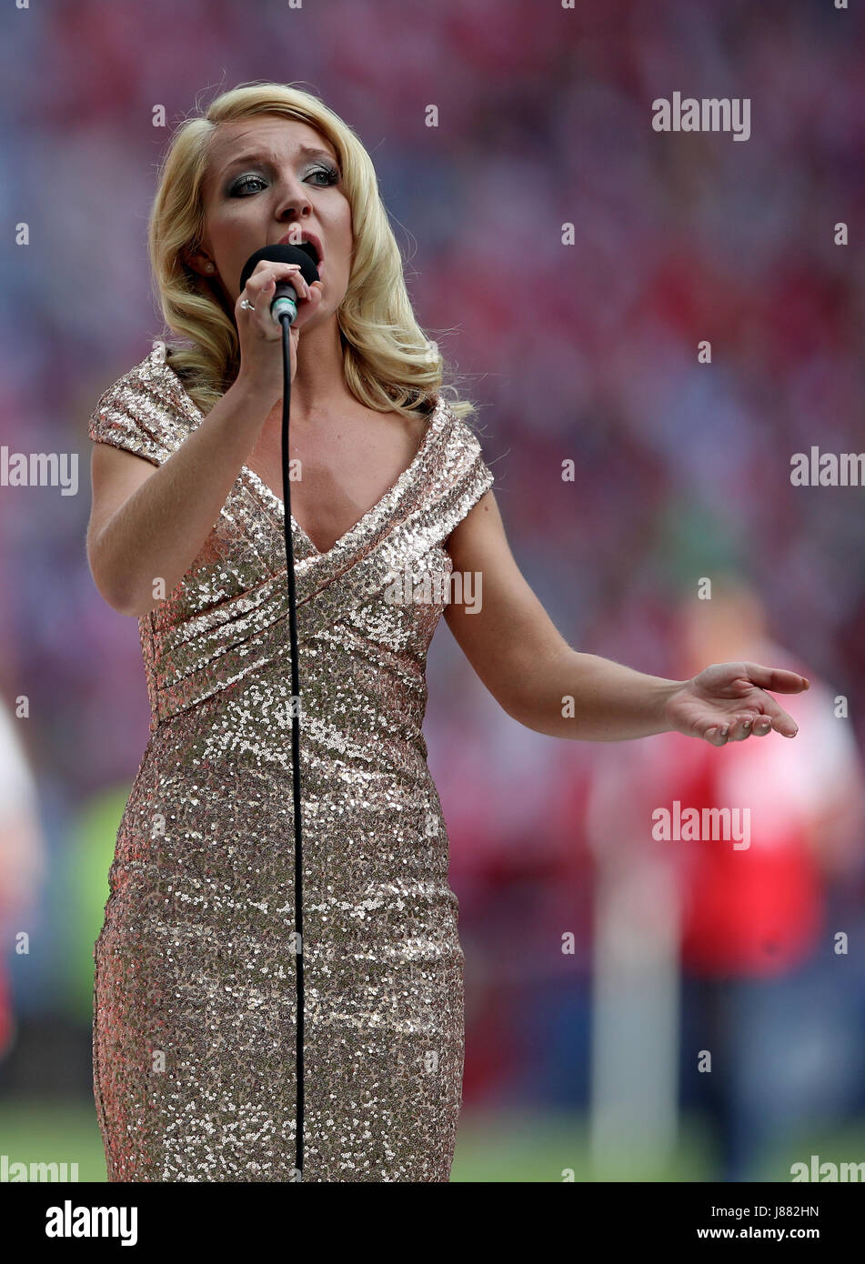 Emily haig sings national anthem hi-res stock photography and images ...