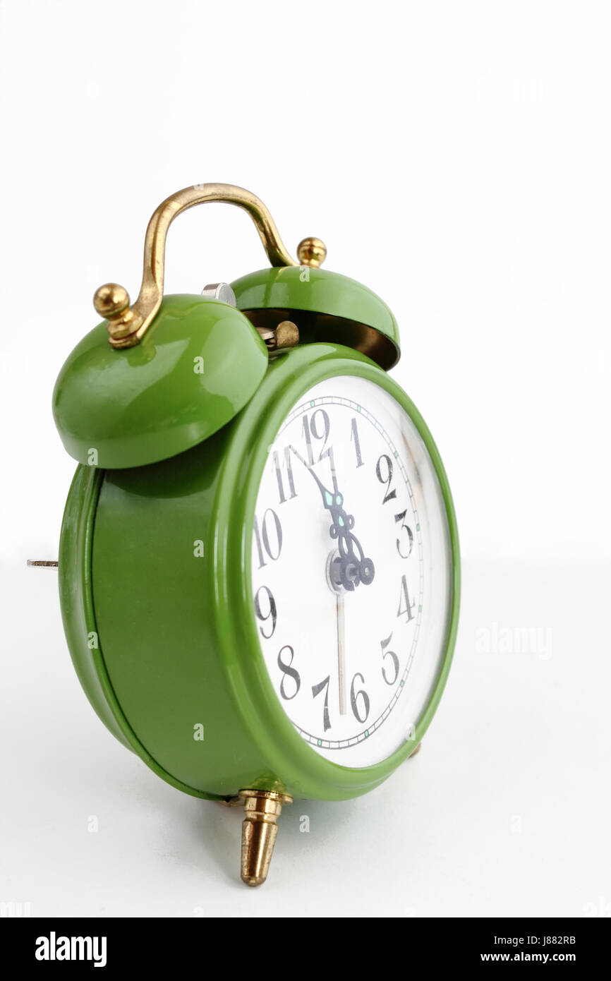green alarm clock Stock Photo - Alamy