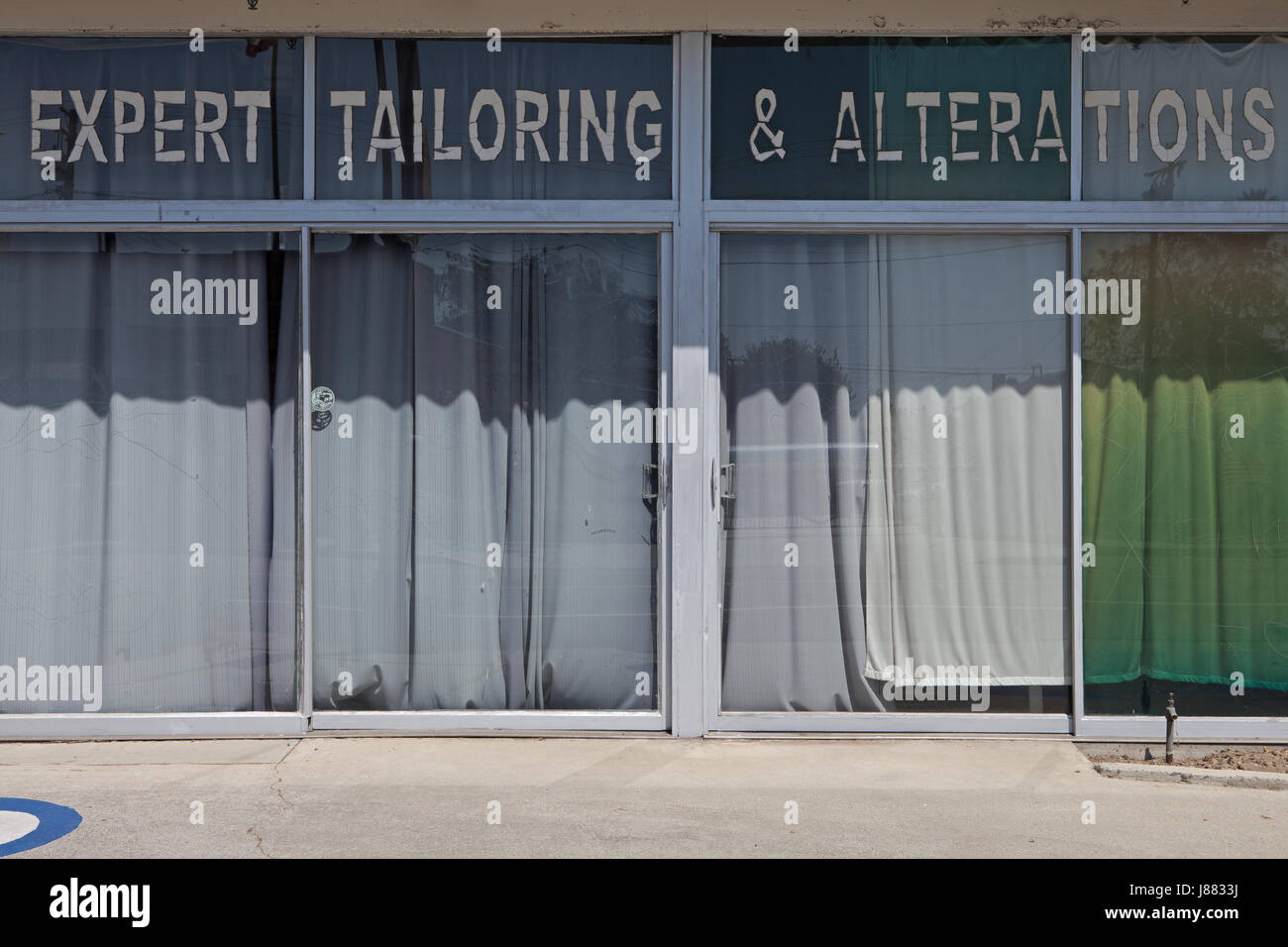 Dry Cleaners front window, Whittier California Stock Photo - Alamy