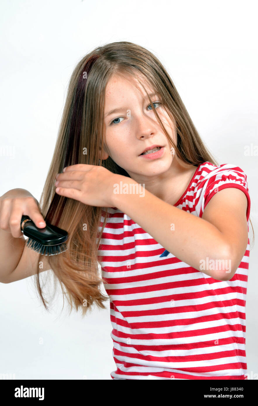girl combs hair Stock Photo - Alamy