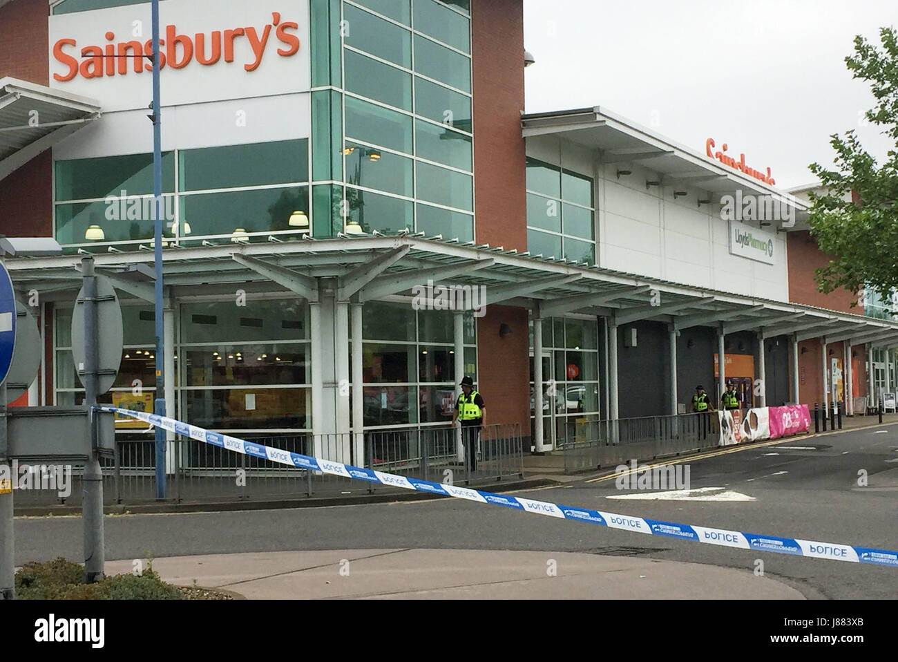 Police outside a Sainsbury's in Blackheath, West Midlands, after a man ...