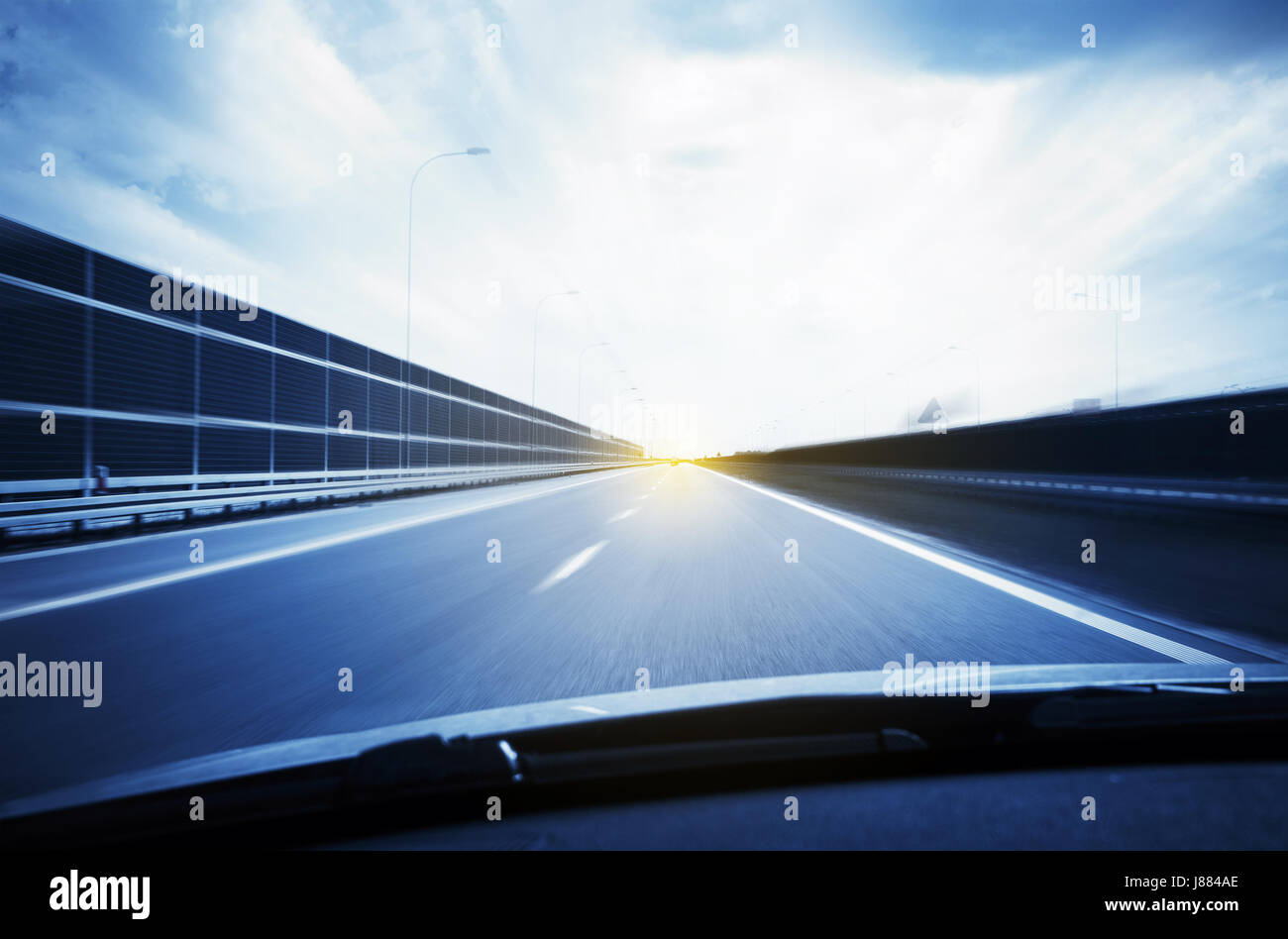 Car view with motion blur road background Stock Photo - Alamy