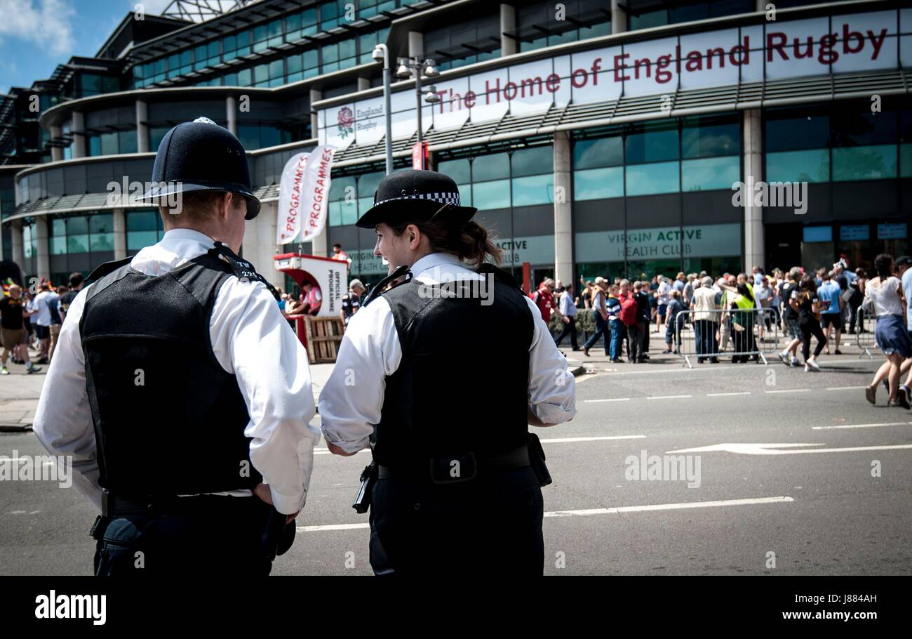 Armed police officers patrol outside the Aviva Premiership Rugby Final ...