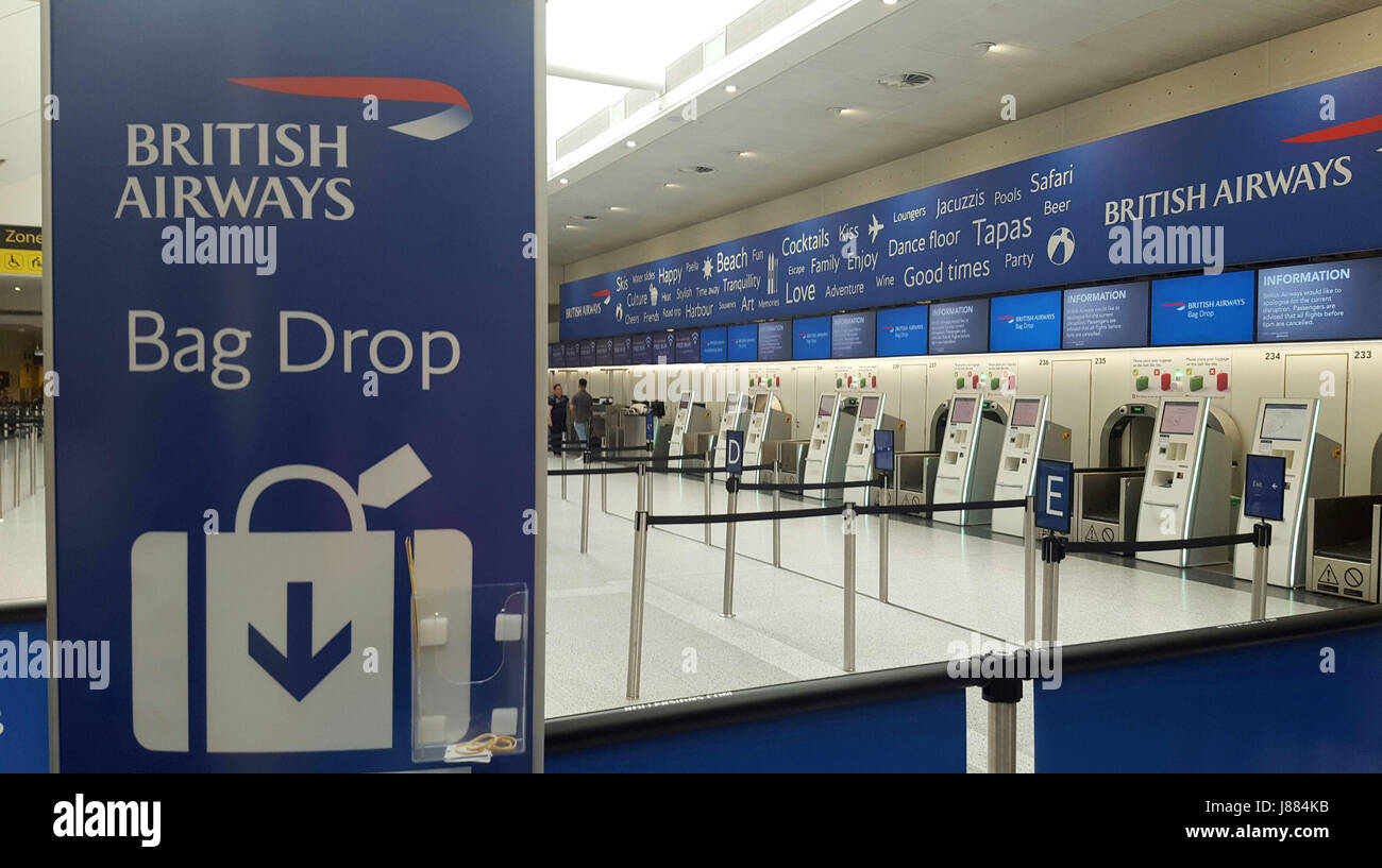 The empty British Airways check-in desk at Gatwick Airport. The airline ...