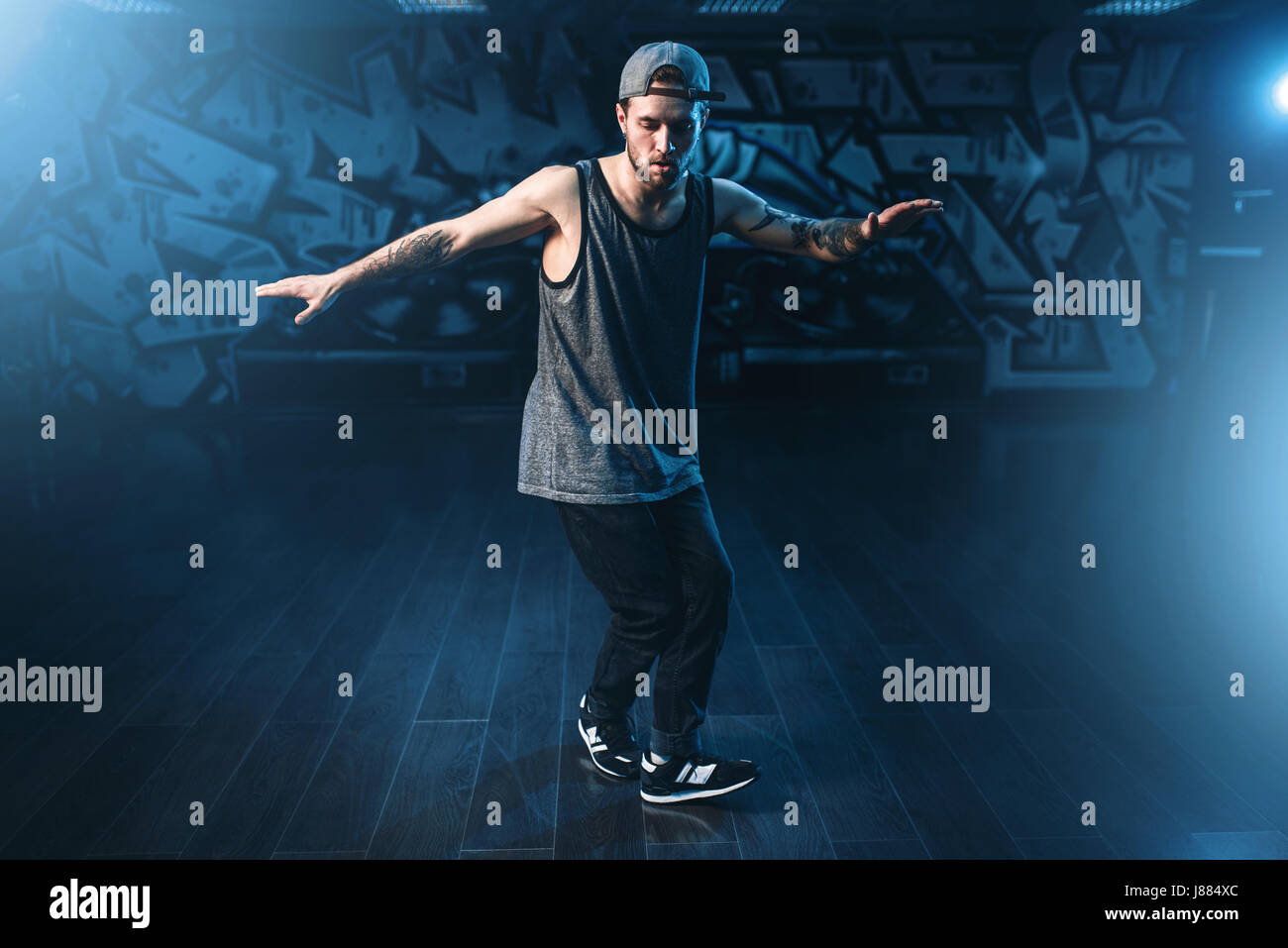 Male rapper in dance studio, trendy lifestyle. Modern urban dancing style Stock Photo - Alamy