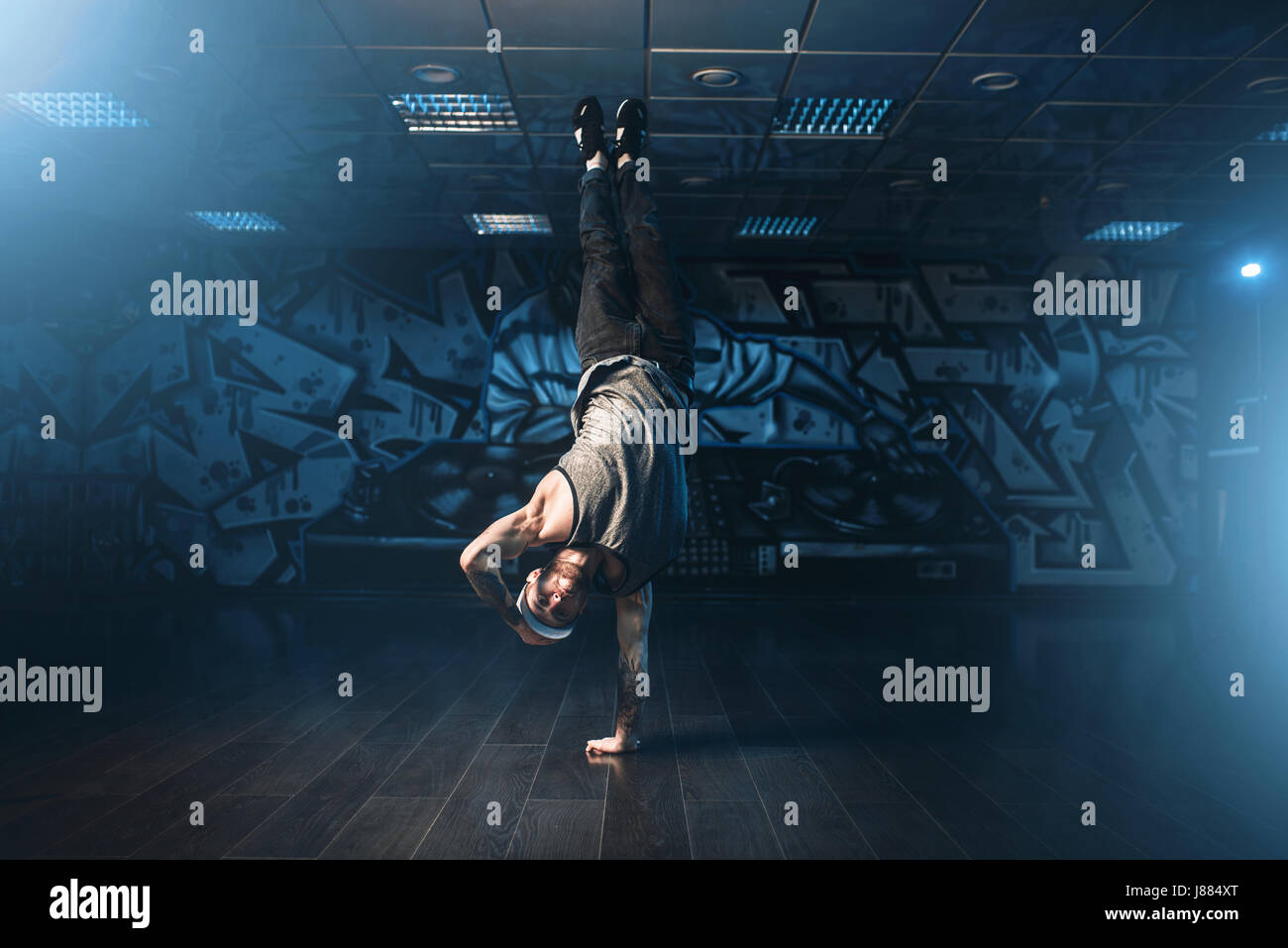 Male rapper in dance studio, trendy lifestyle. Modern urban dancing ...