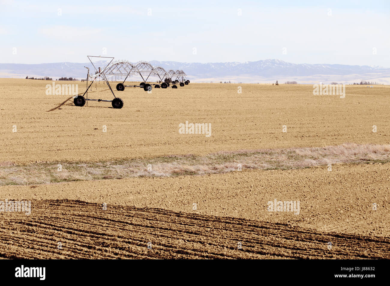 A center pivot sprinkler awaiting the new irrigation season Stock Photo ...