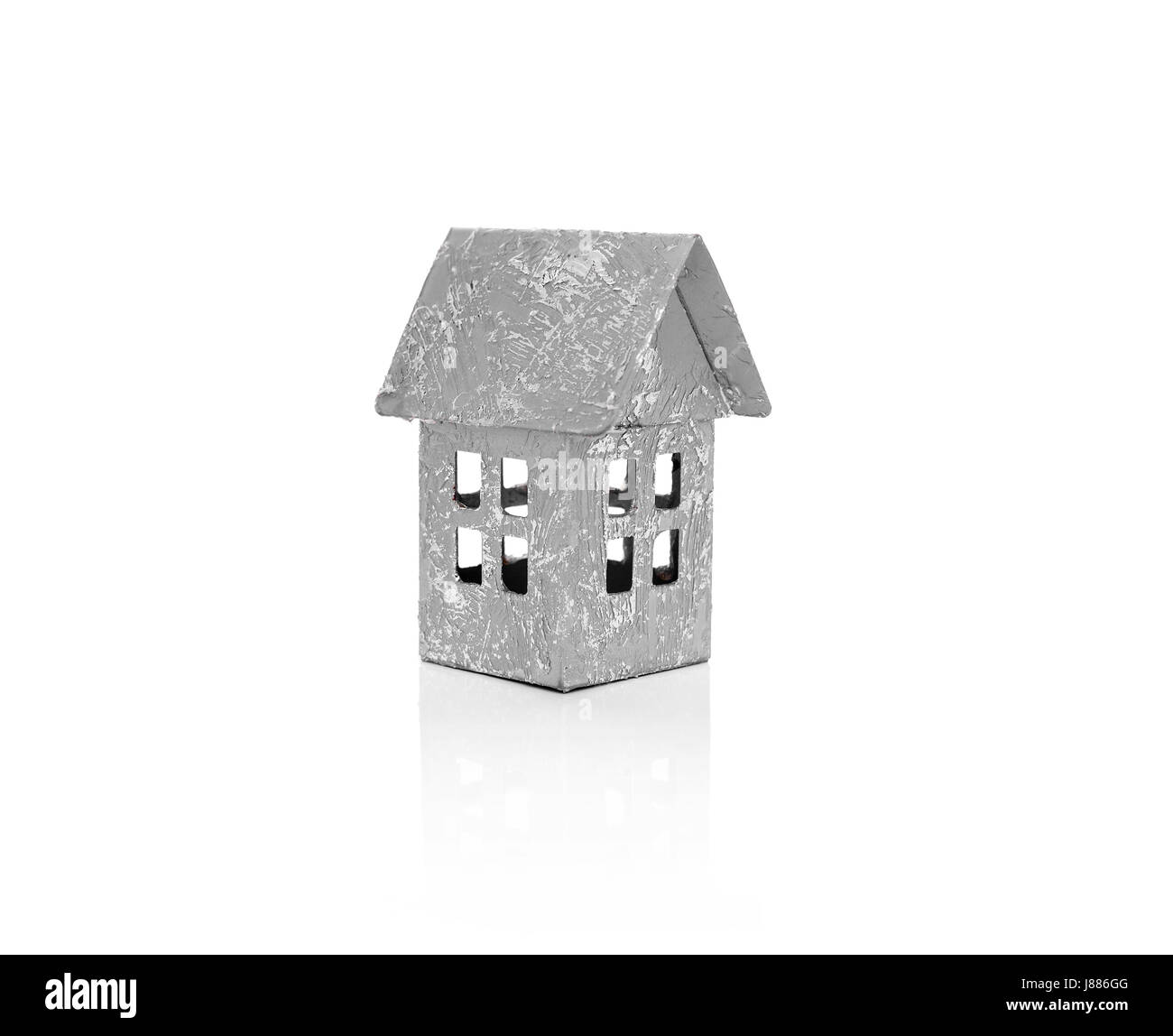 Model of a small house. Isolated on white background Stock Photo - Alamy