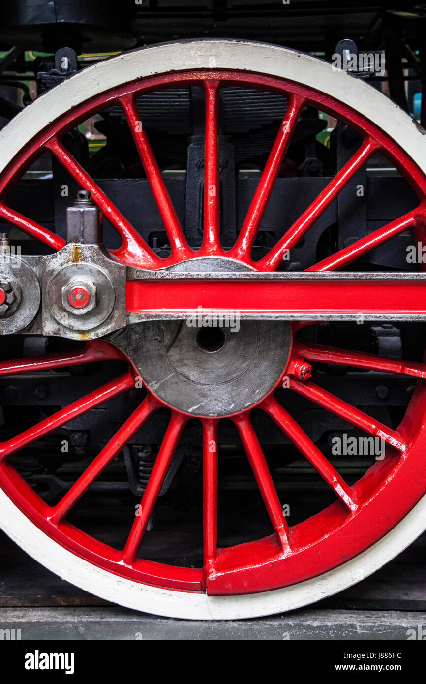 Artistic close up detail of a large steam engine train wheel at the ...