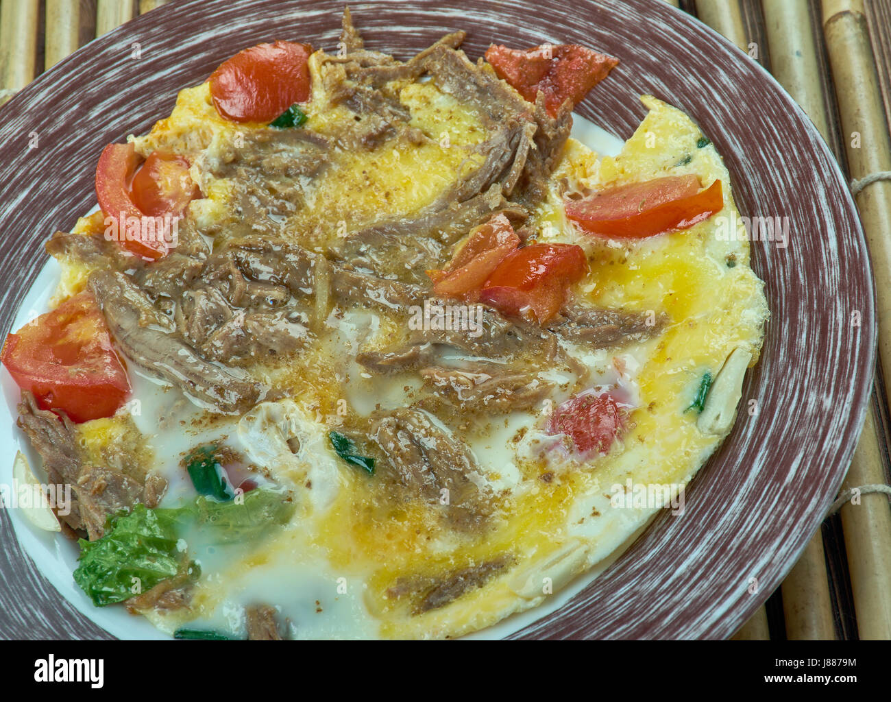 Machacado con huevo. Mexican cuisine Stock Photo - Alamy