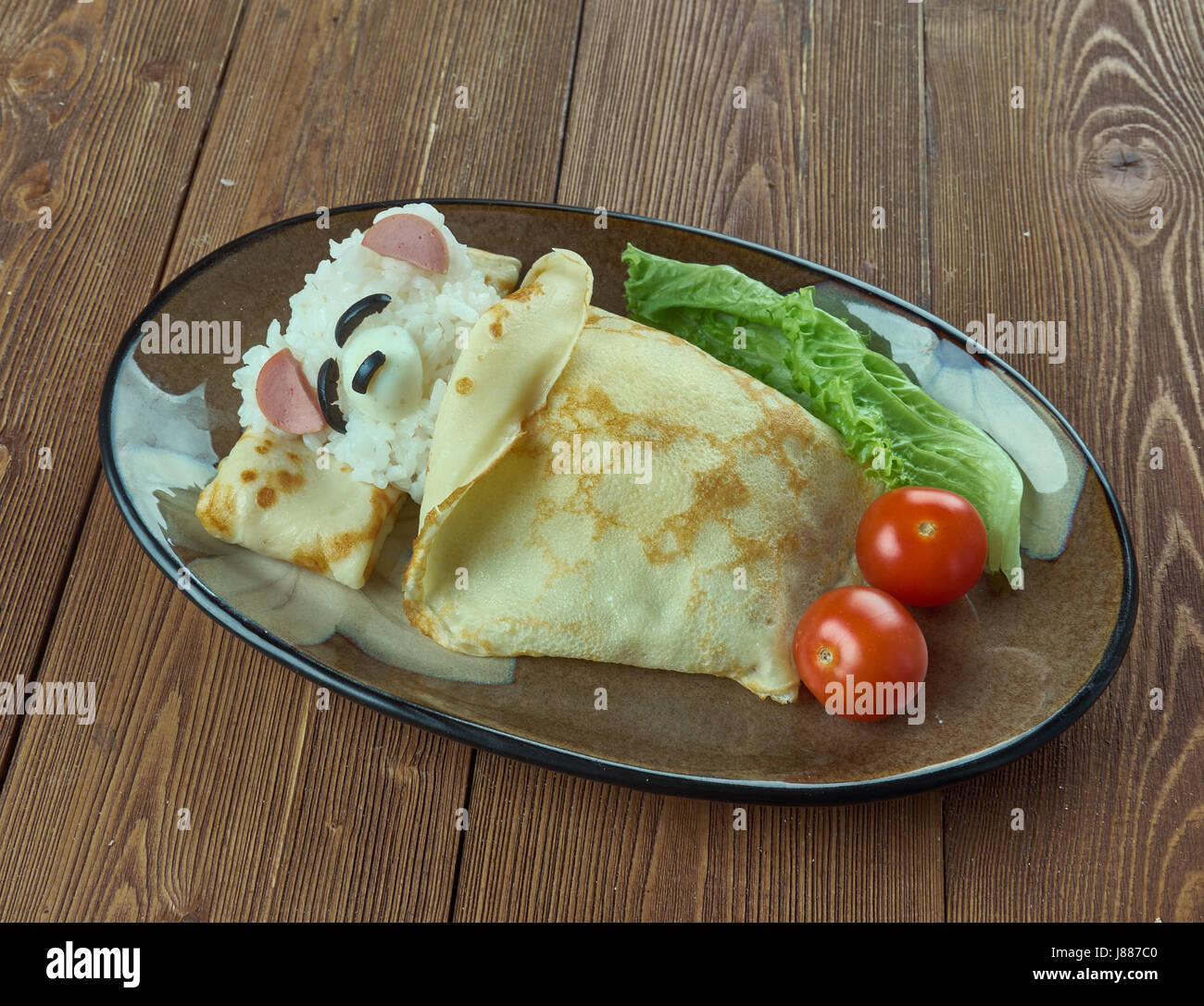 creative food concept - sleeping polar bear made of rice, pancake and ...