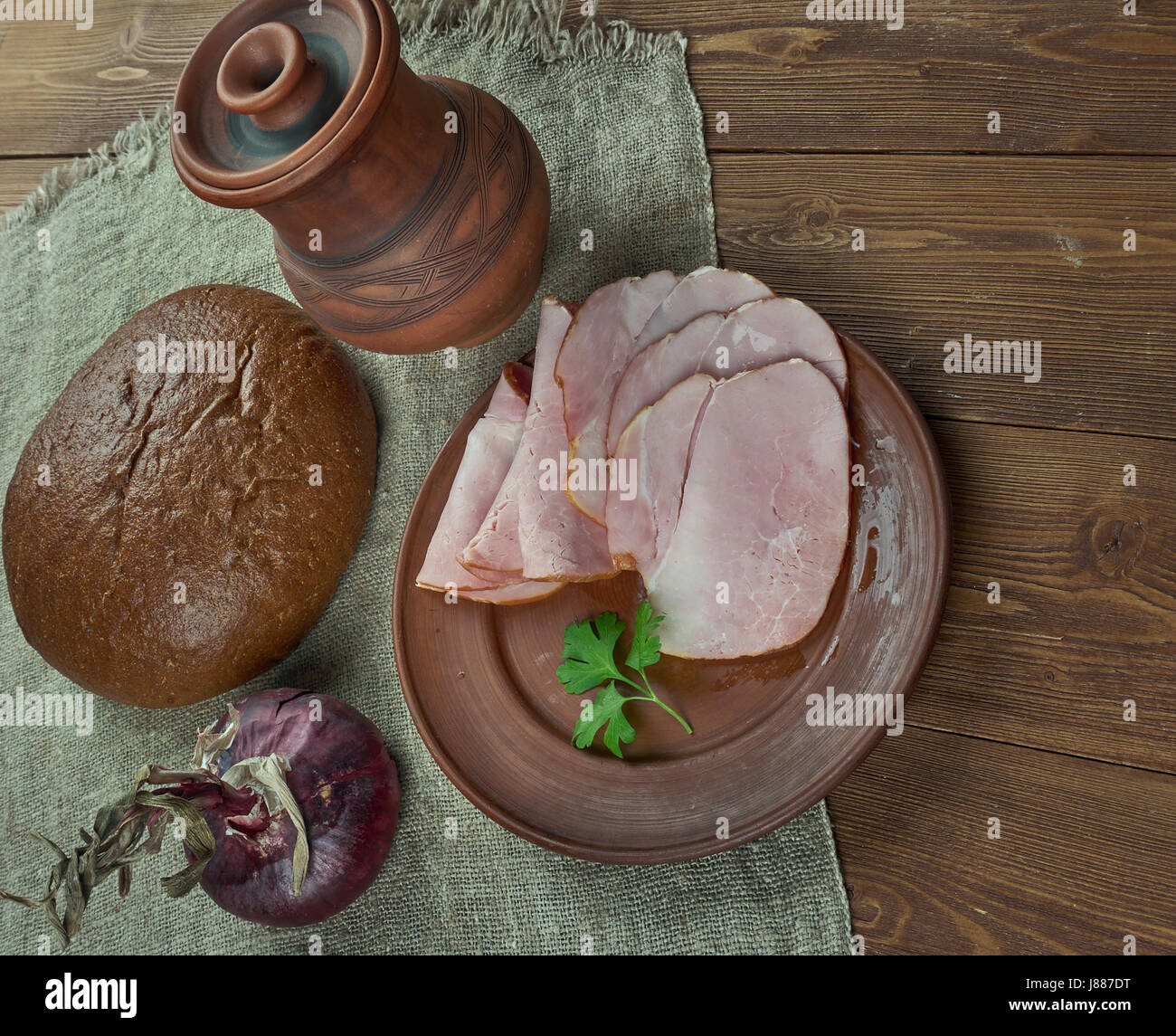 Palvikinkku - Finnish smoked ham. Rustic style Stock Photo - Alamy