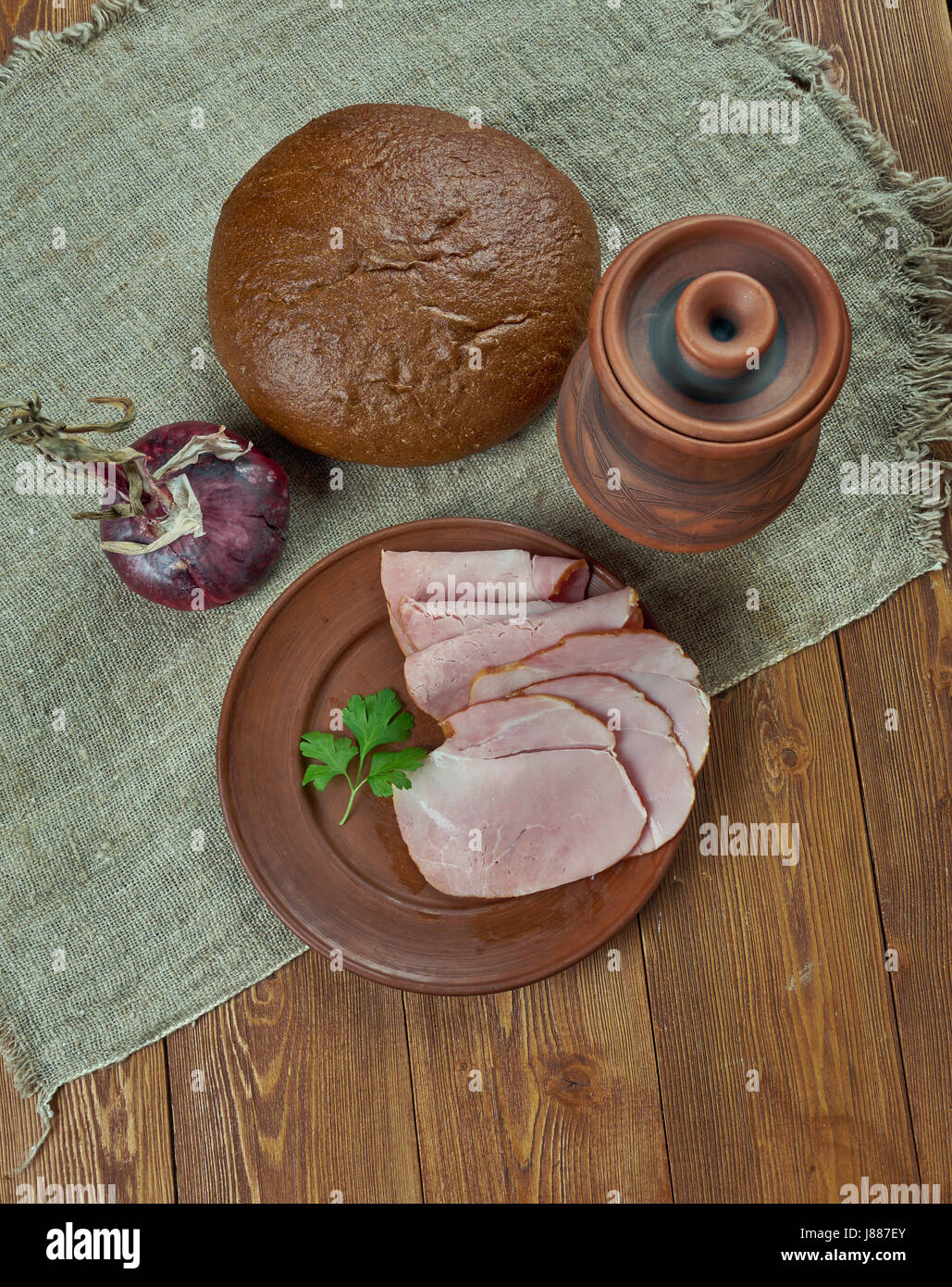 Palvikinkku - Finnish smoked ham. Rustic style Stock Photo - Alamy