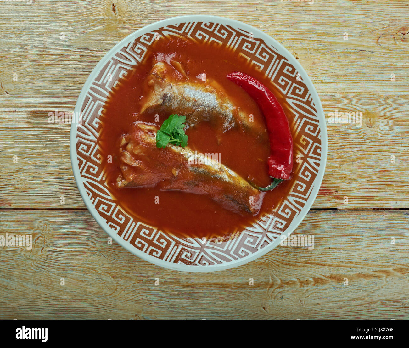 Kerala-style fish curry - Meen Curry Stock Photo - Alamy