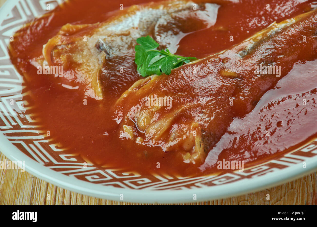 Kerala-style fish curry - Meen Curry Stock Photo - Alamy
