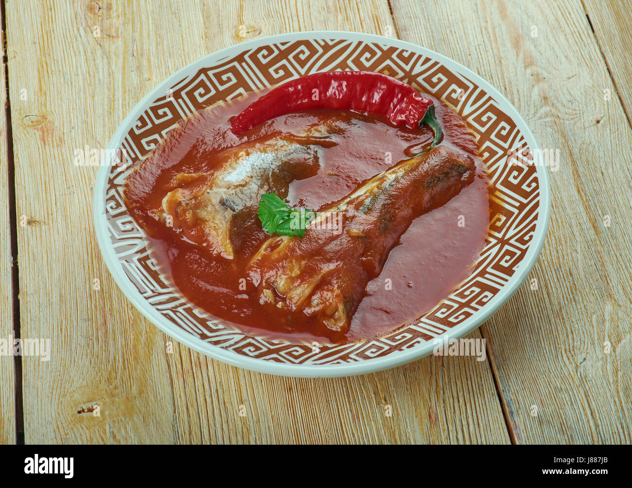 Kerala-style fish curry - Meen Curry Stock Photo - Alamy
