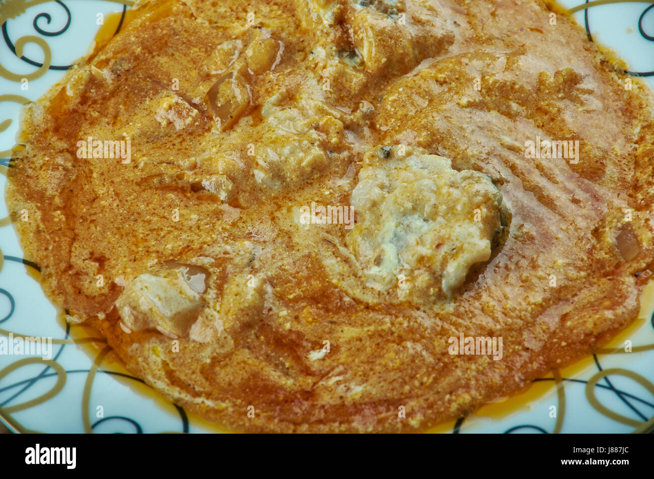 Macher Jhol - traditional Bengali and Odia spicy fish stew Stock Photo ...