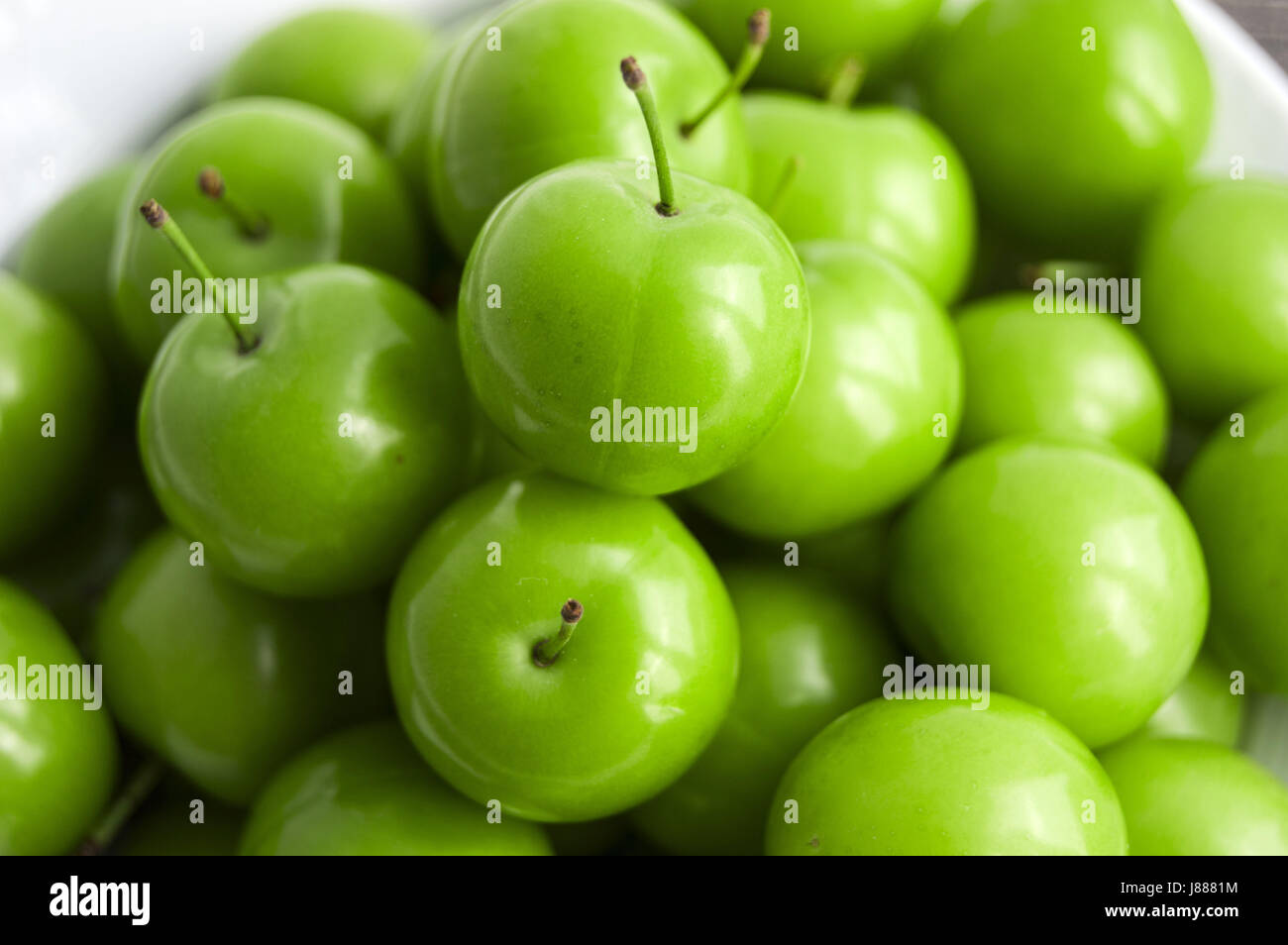 Sour plum pictures on white ground, wonderful sour plums, green plums ...