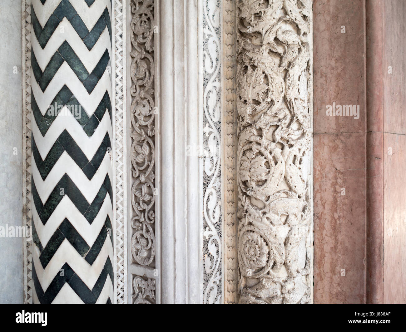Polychromatic stone work detail from Lucca Duomo door Stock Photo - Alamy
