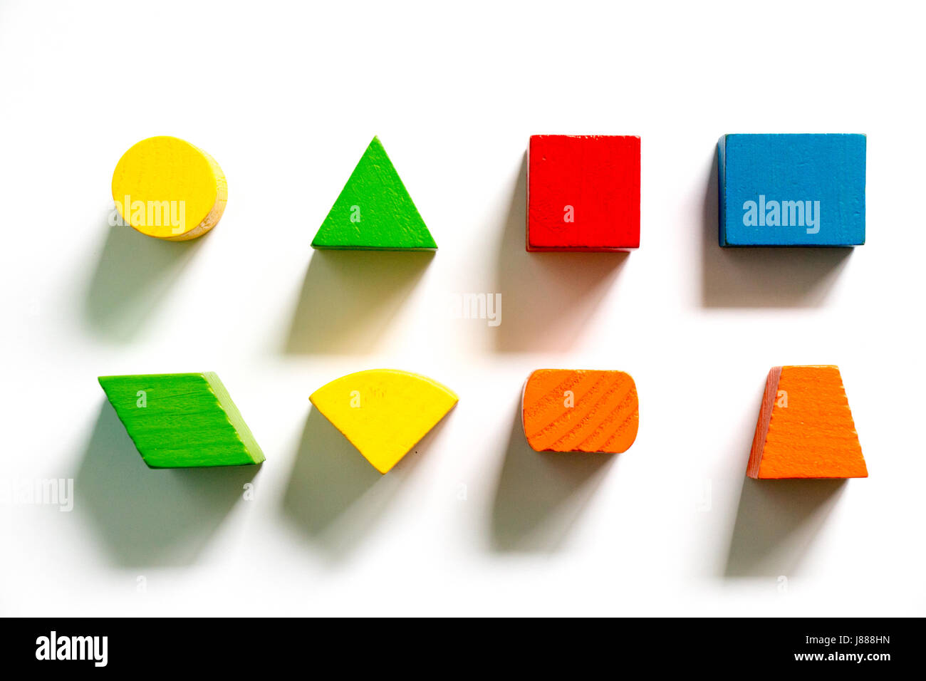 Set of colorful wooden shape toy on white background Stock Photo - Alamy