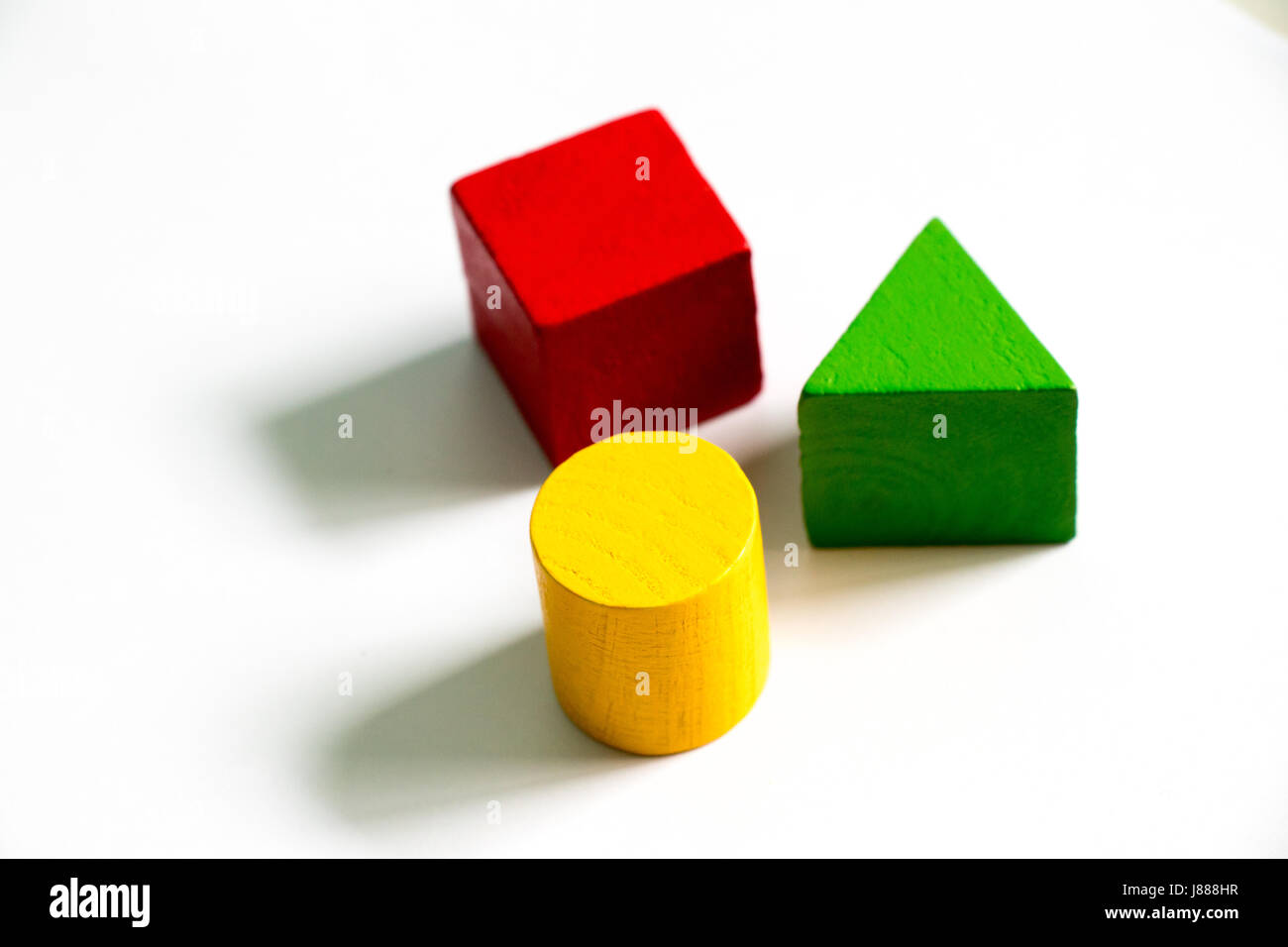 Set of colorful wooden shape toy (Square, triangle, round) on white ...