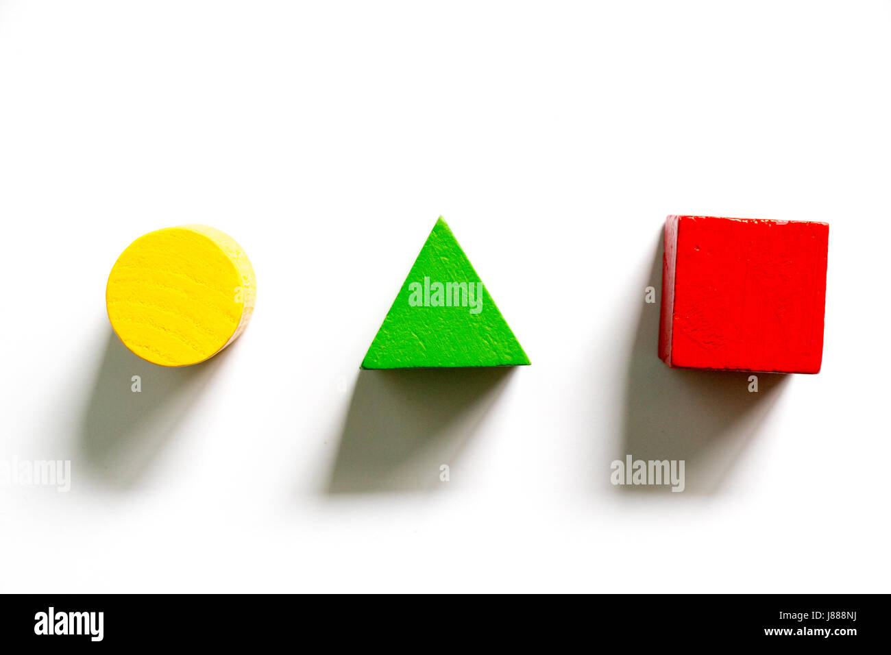 Set of colorful wooden shape toy (Square, triangle, round) on white ...