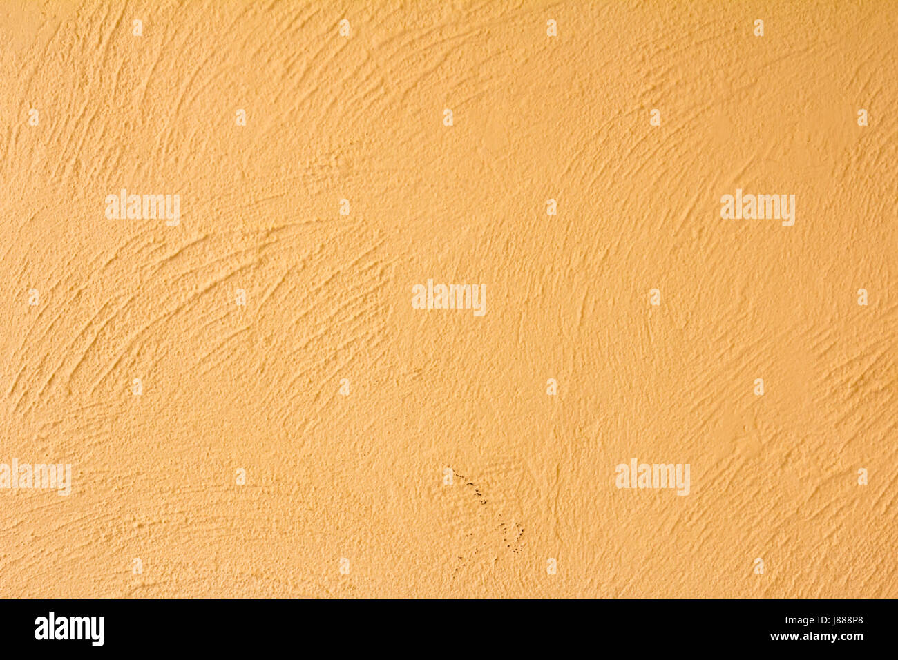 Orange color concrete wall background Stock Photo - Alamy