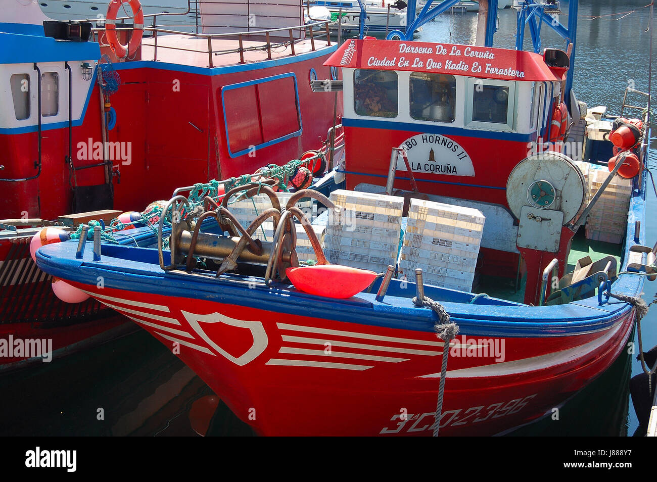 Typical Galician shipping boats in the port of La Coruna, Galicia ...