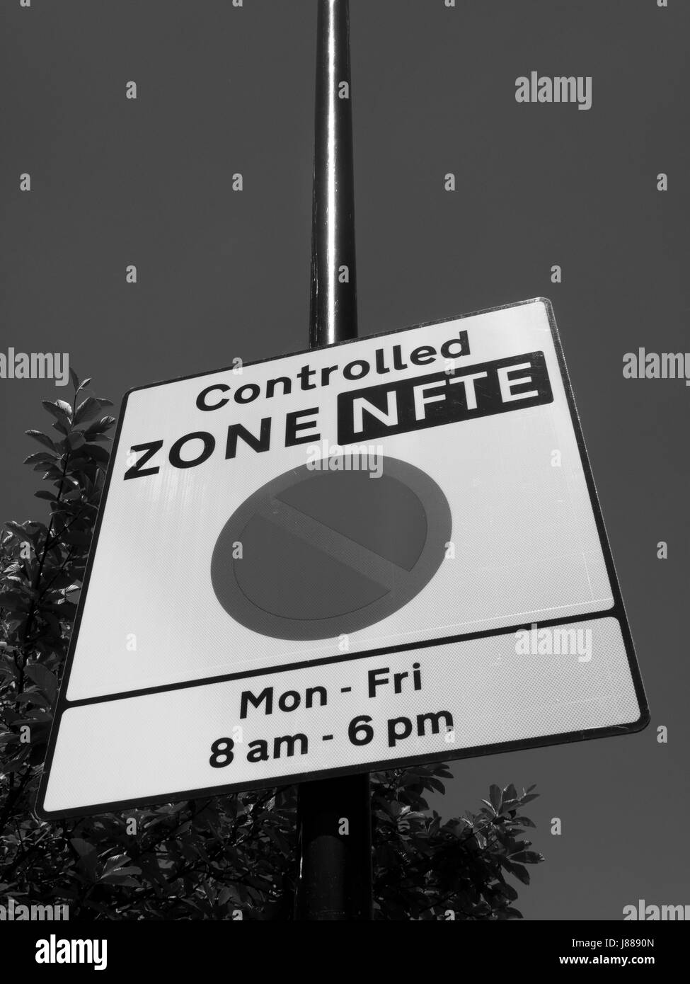 Controlled zone parking sign Black and White Stock Photos & Images - Alamy