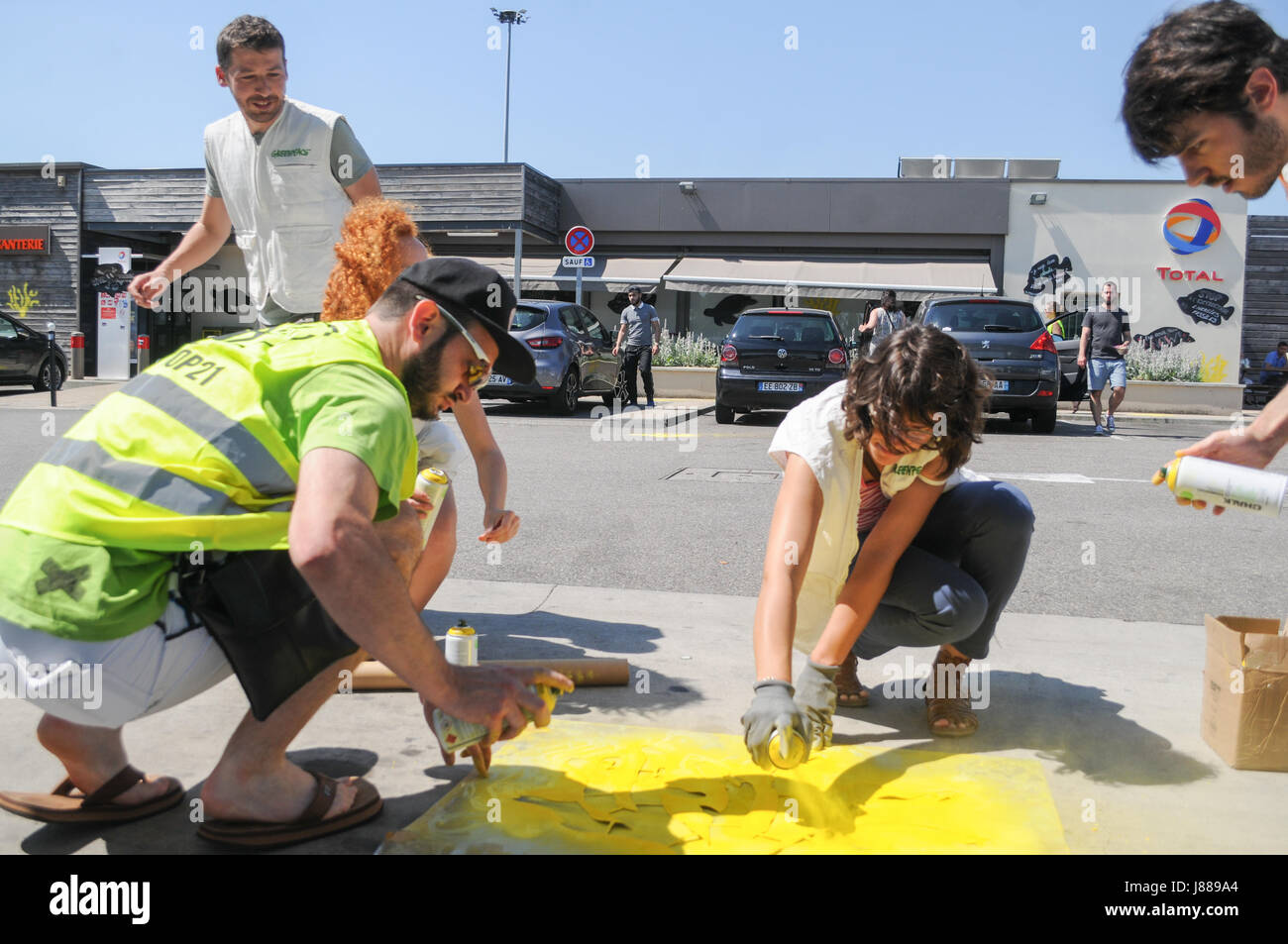 Greenpeace and ANV-COP 21 activists protest against Total's drilling ...