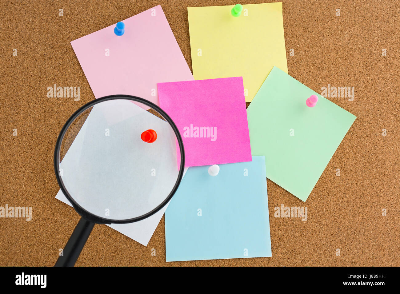 Black magnifying glass with blank notes Stock Photo - Alamy