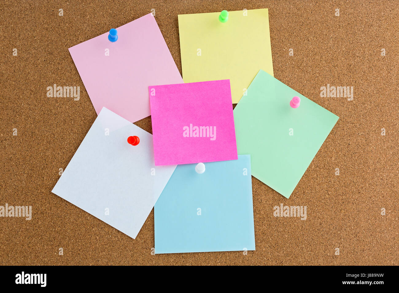 Notes with pin on cork bulletin board Stock Photo - Alamy
