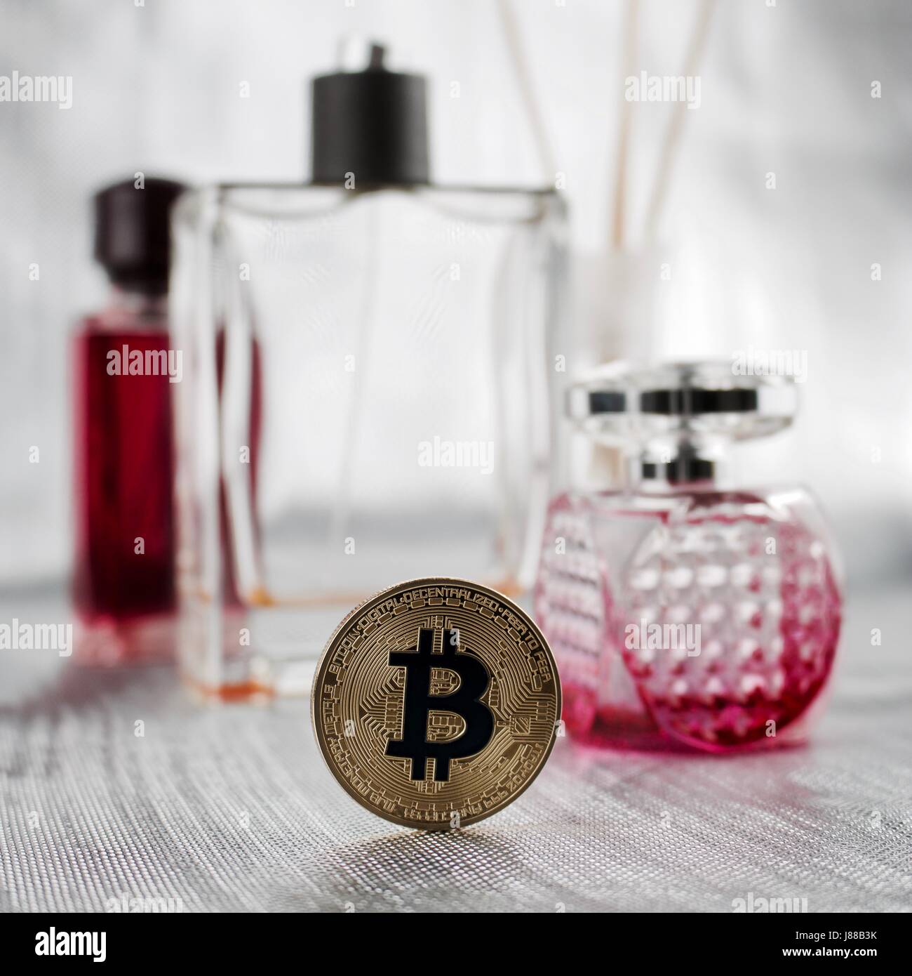 Digital currency physical gold bitcoin coin. Perfume composition Stock ...