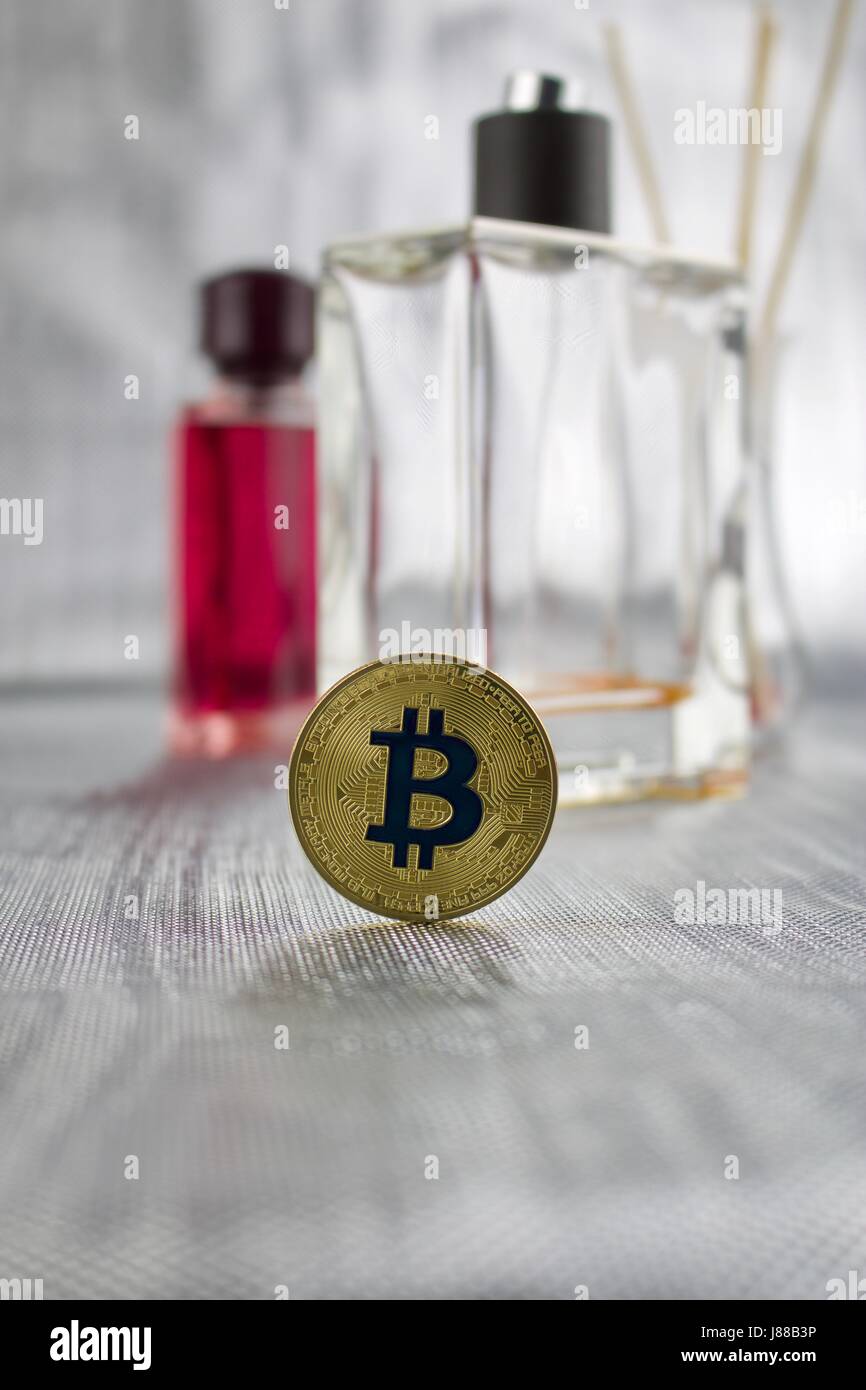 Cryptocurrency physical gold bitcoin coin in perfume spa Stock Photo ...
