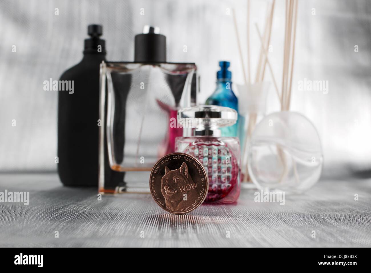Digital currency physical brass doge coin perfume concept Stock Photo ...