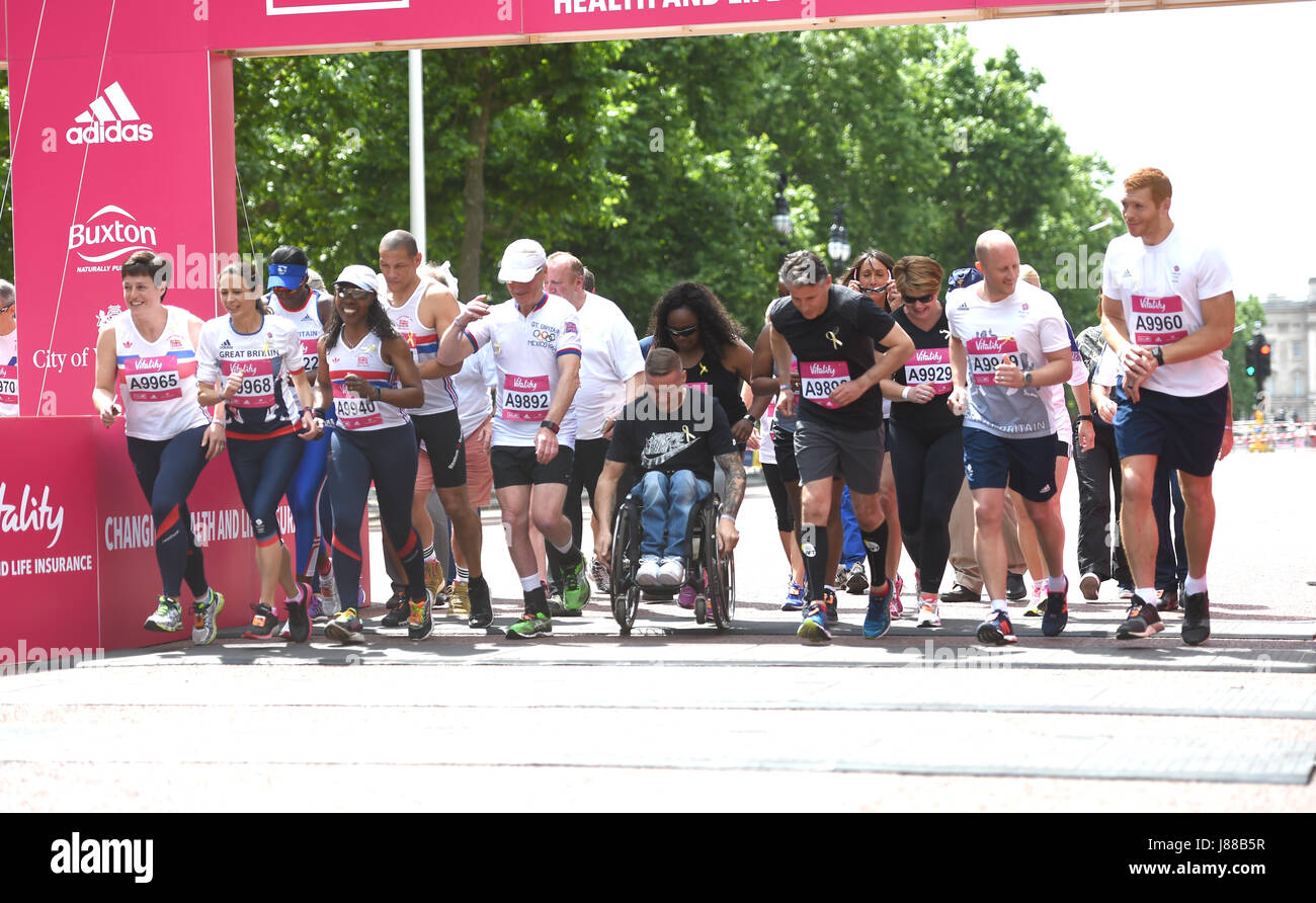 Jo Pavey (second left), David Weir (centre) and Lord Sebastian Coe ...