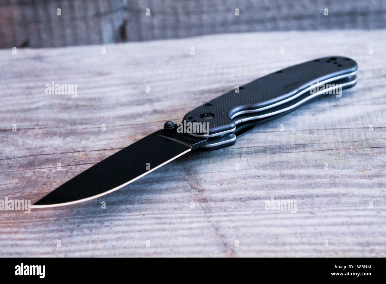 View of the knife at an acute angle. Blade of knife. Handle of the ...