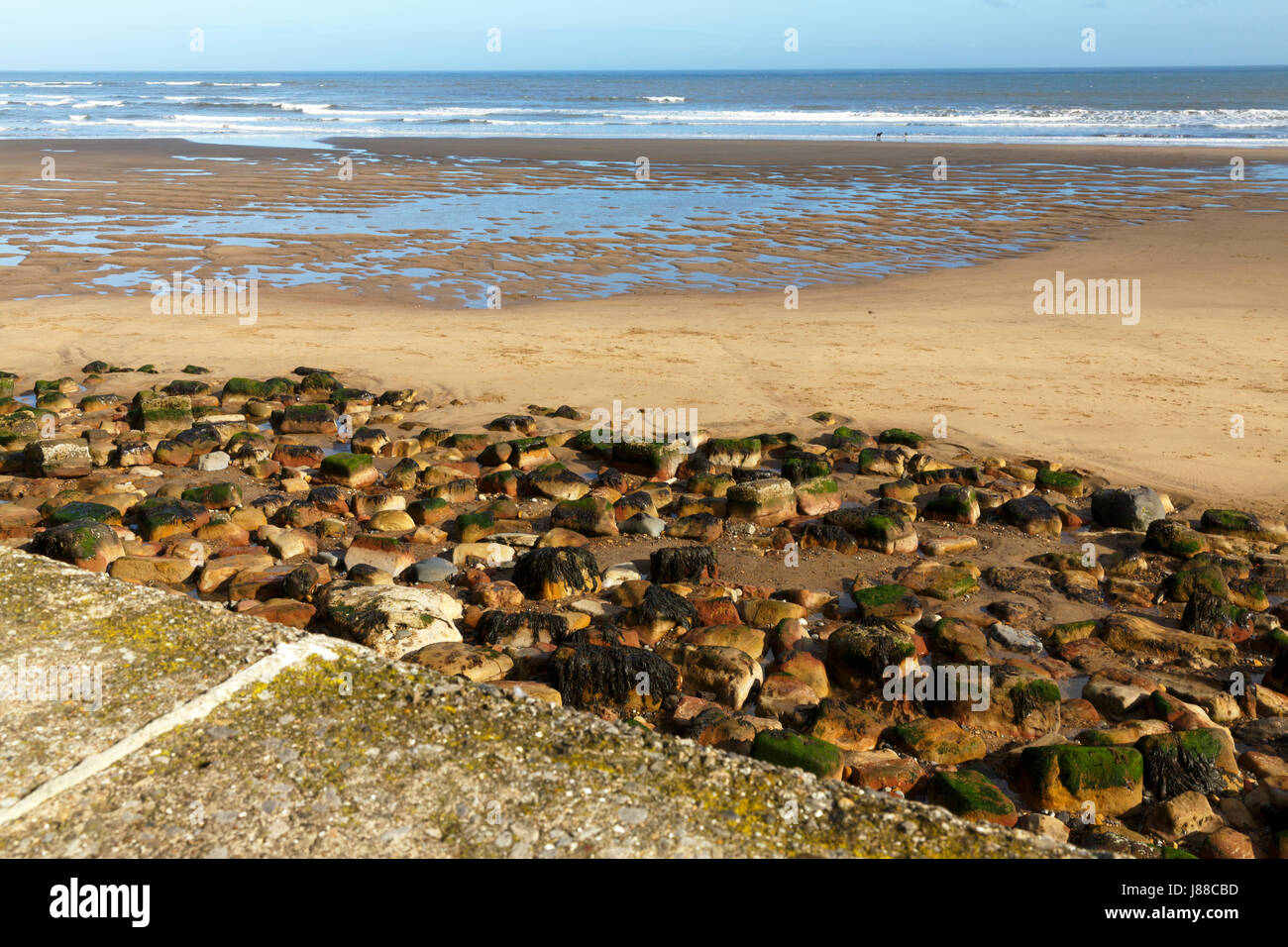 Beach & Rocks at Sandsend in Yorkshire, England Stock Photo - Alamy