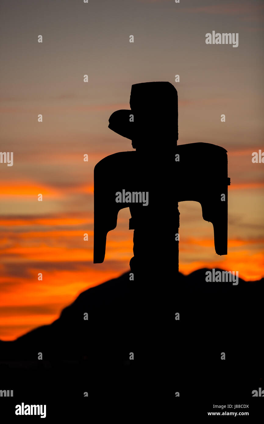 Silhouette of a Totem Pole during sunset in Alaska, USA Stock Photo - Alamy