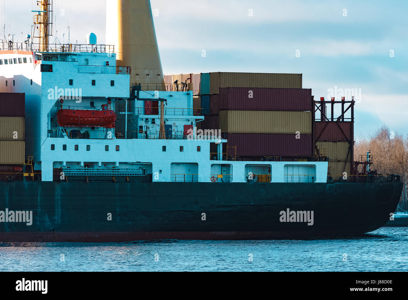 Modern black container ship moving from Baltic sea Stock Photo - Alamy