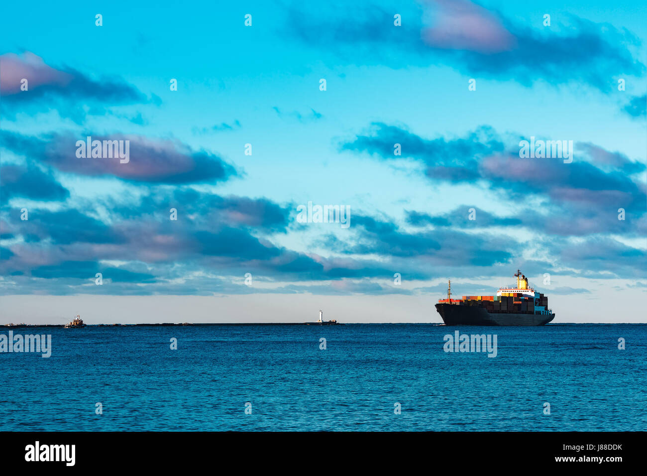 Modern black container ship moving from Baltic sea Stock Photo - Alamy