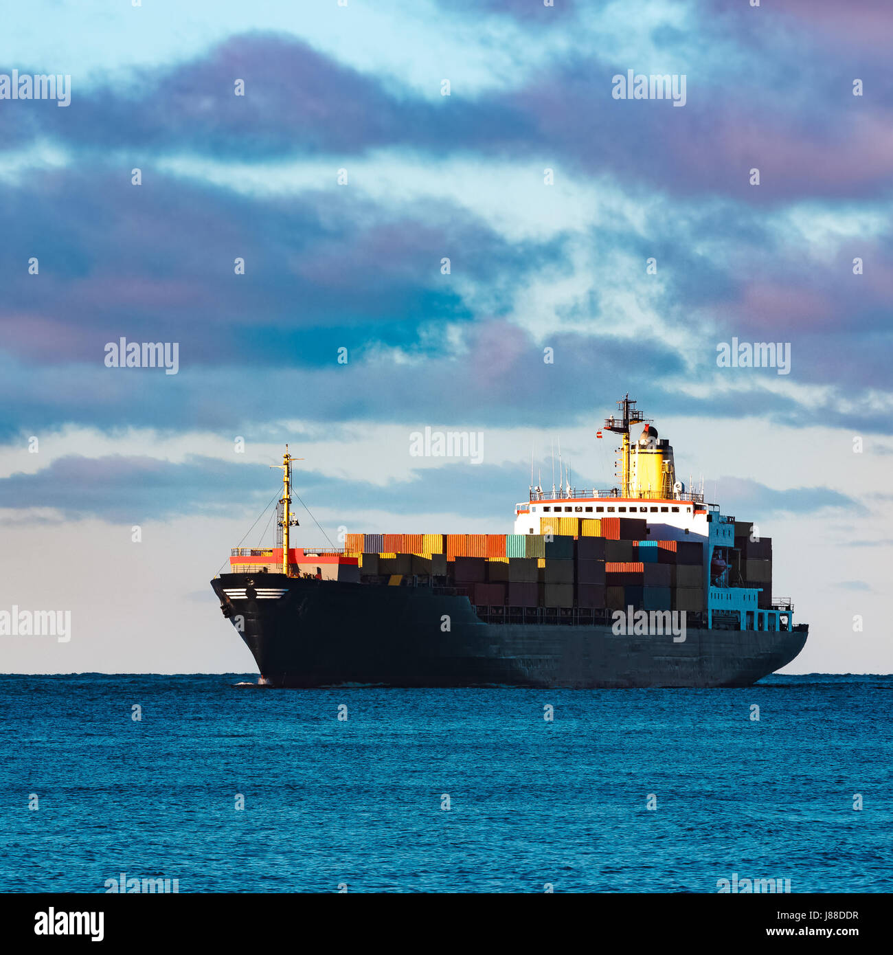 Modern black container ship moving from Baltic sea Stock Photo - Alamy