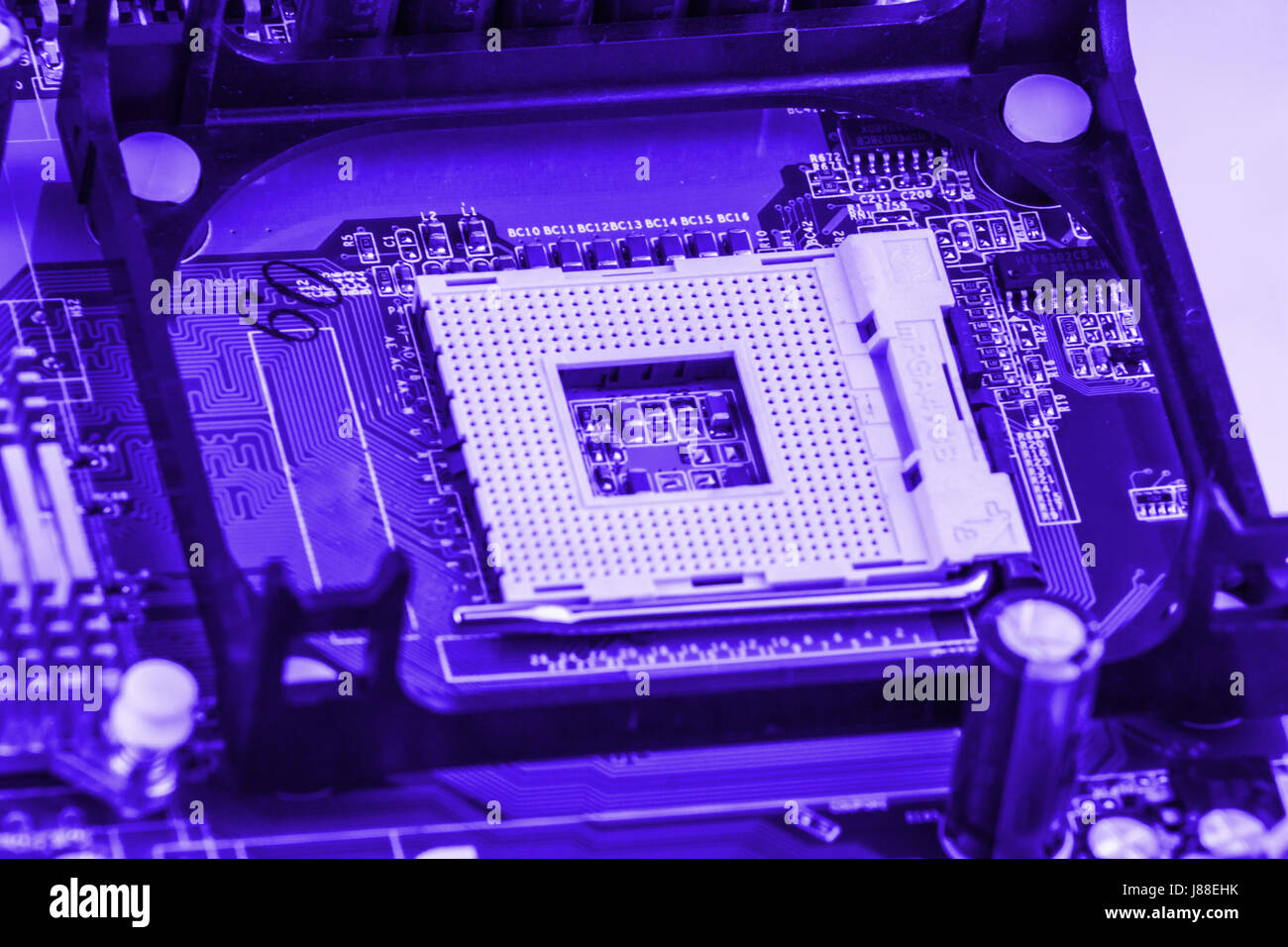 CPU socket on a computer motherboard macro close Stock Photo - Alamy