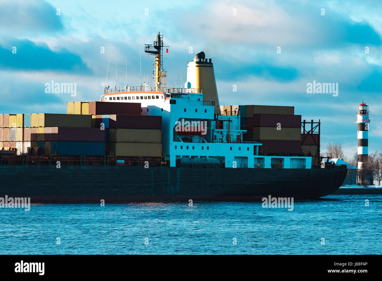 Modern black container ship moving from Baltic sea Stock Photo - Alamy