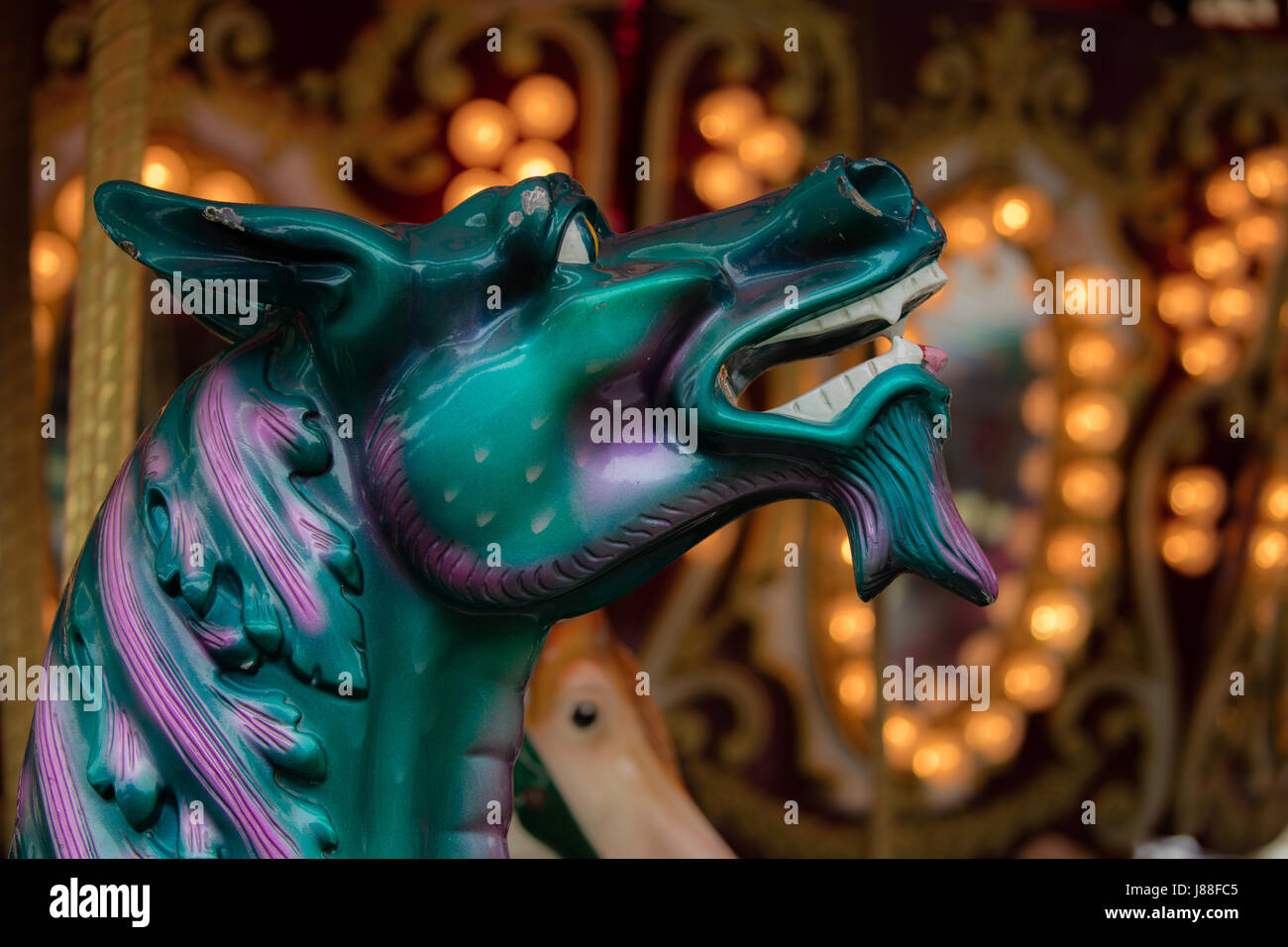 Merry go round animals at the county fair Stock Photo - Alamy